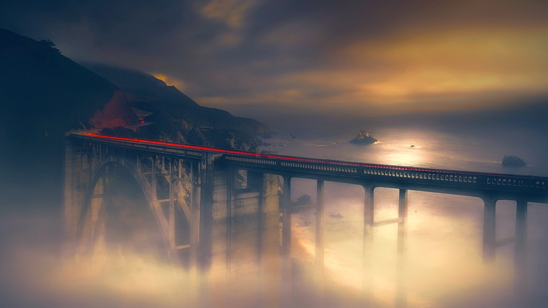 Nighttime Fog Over Man-Made Bridge: A Stunning Time-Lapse HD Wallpaper