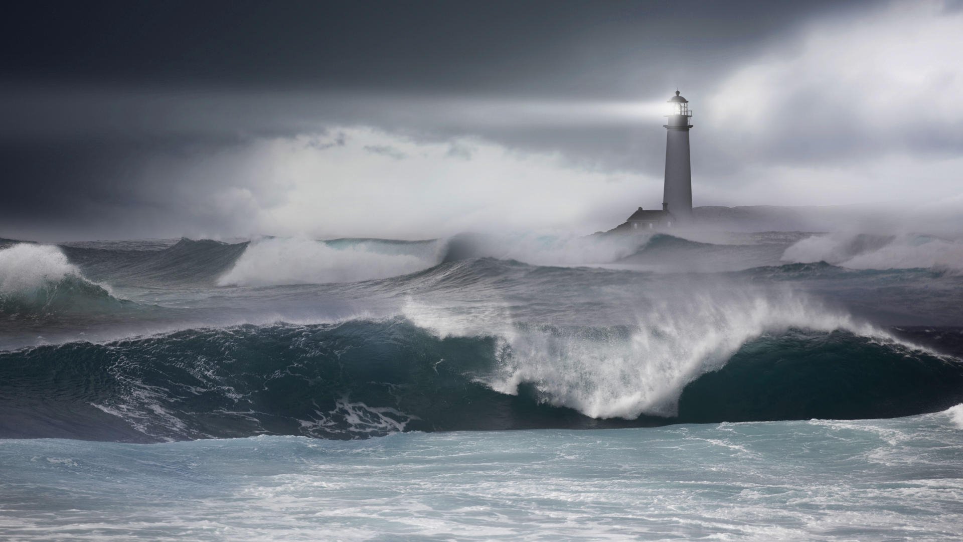 Ocean Waves Crashing by a Towering Lighthouse – Stunning HD Wallpaper