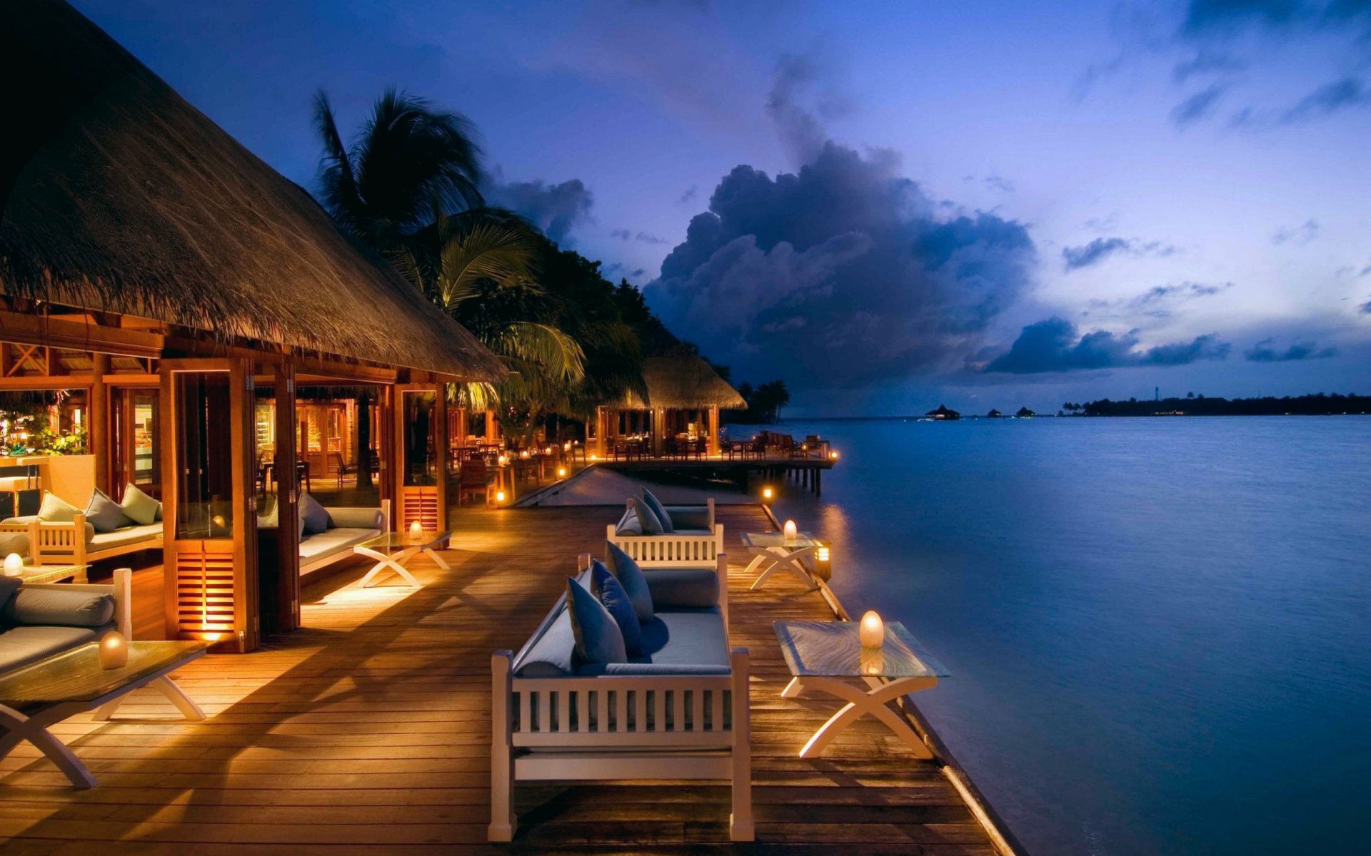 Serene Overwater Room: Stunning Man-Made Escape at Dusk HD Wallpaper