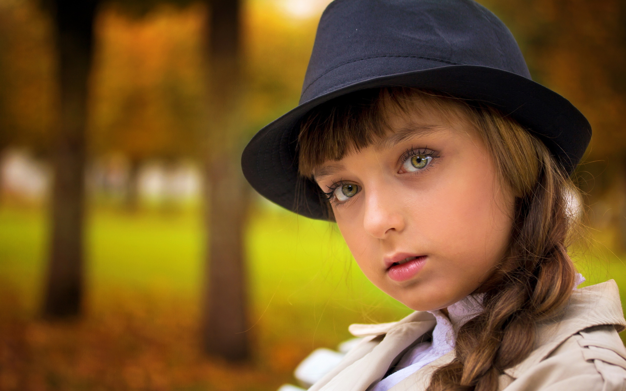 HD Portrait: Captivating Child in Autumn Glow