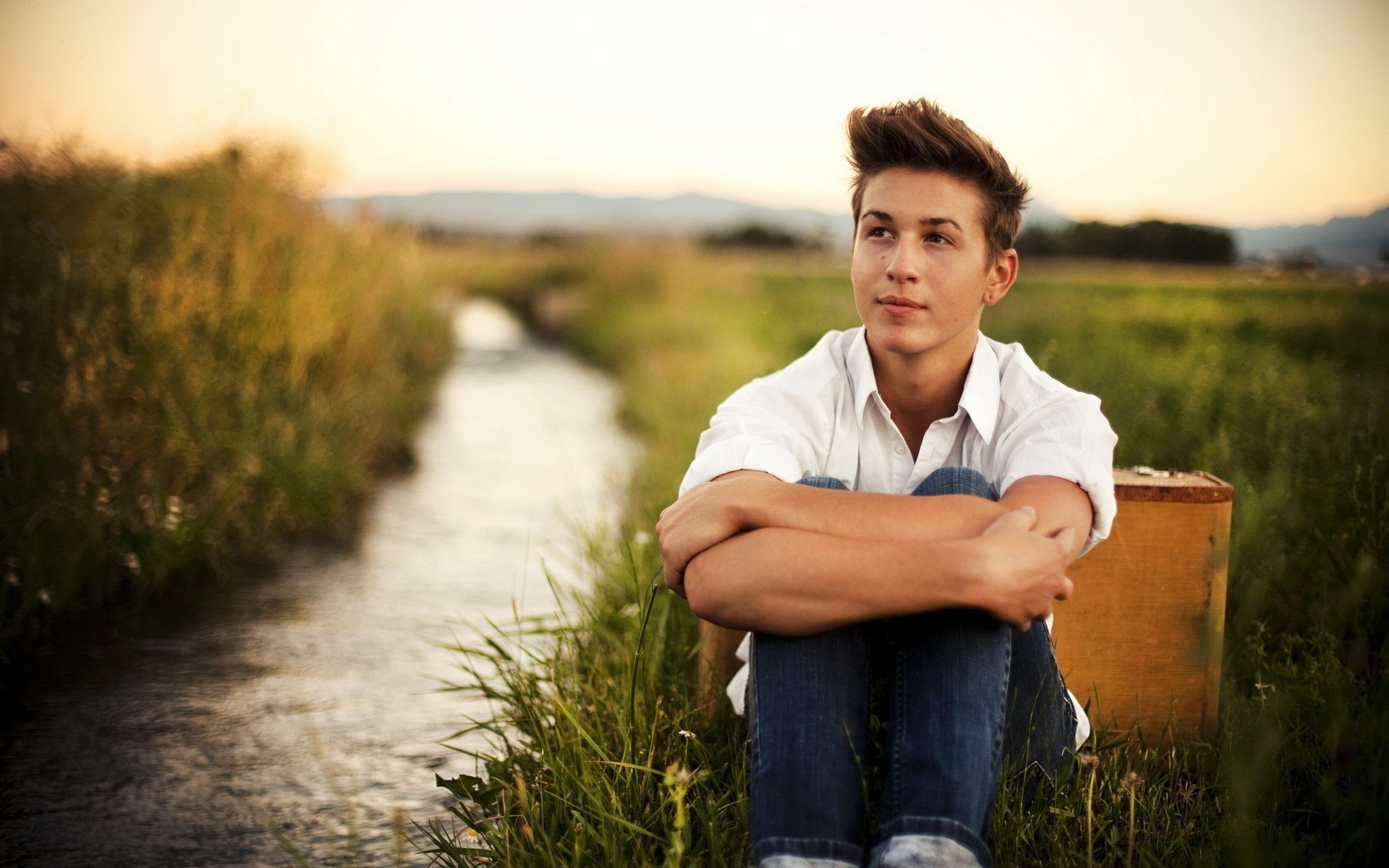 Contemplative Moments: HD Mood Portrait of a Young Man in Nature