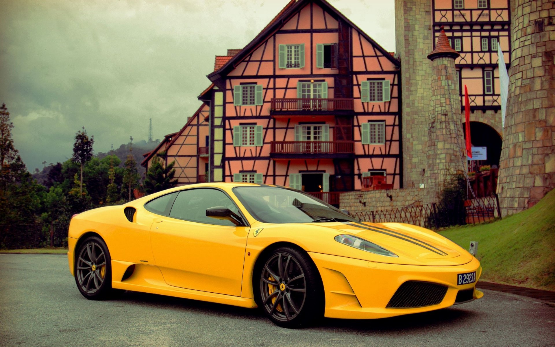 HD Ferrari Scuderia: Sleek Yellow Performance