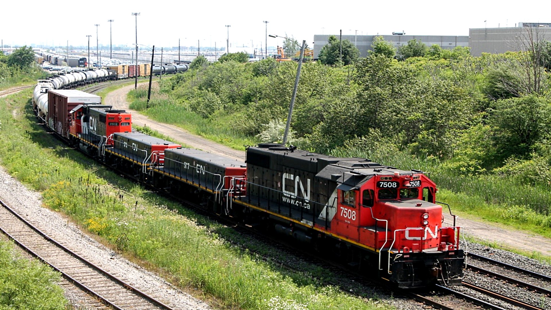 HD Train Adventure: Powerful CN Locomotive in Motion