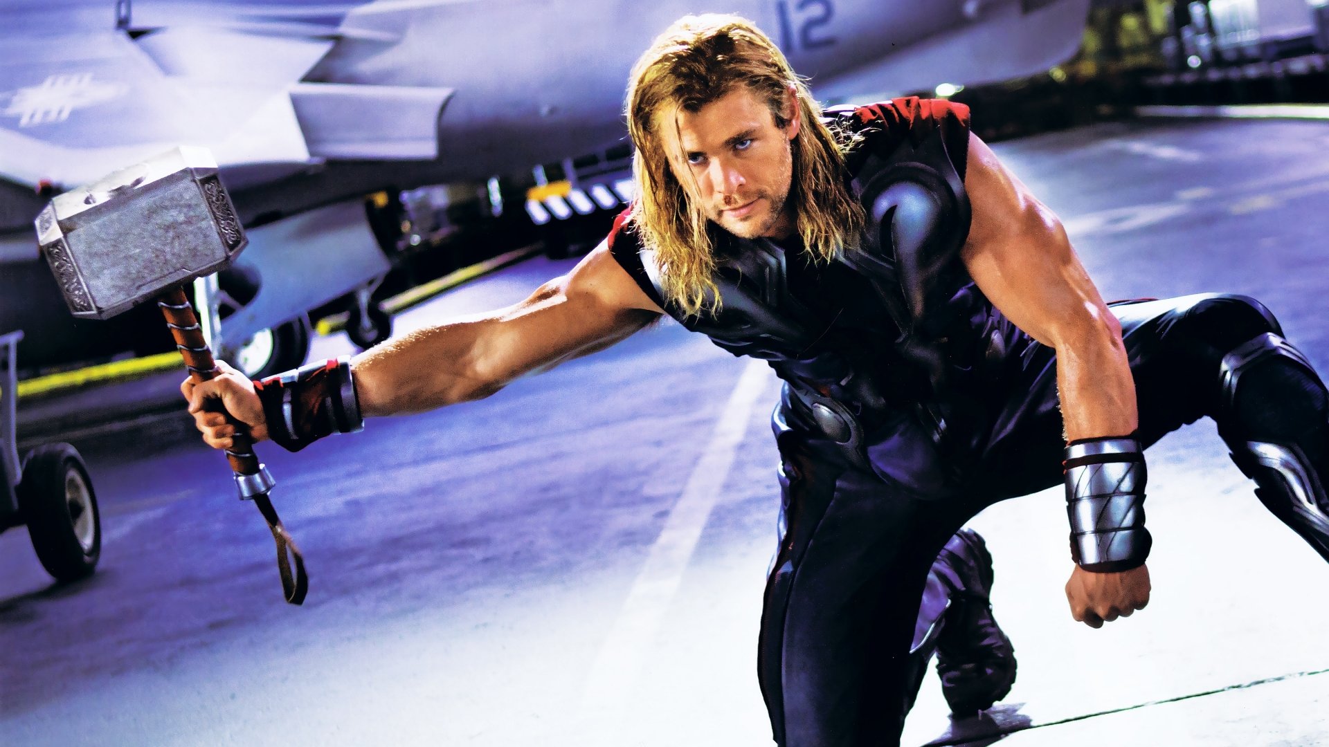Thor Strikes: Chris Hemsworth’s Epic HD Avengers Wallpaper