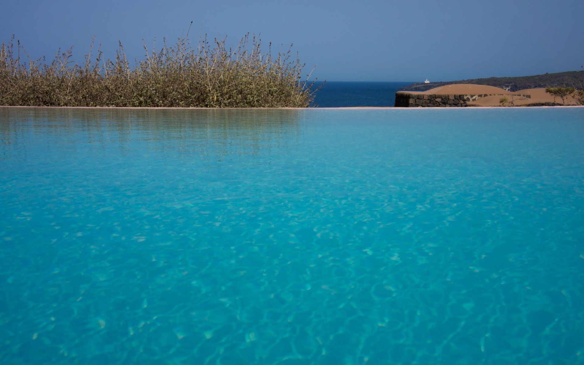 2K Quad HD Man-Made Infinity Pool Over the Sea