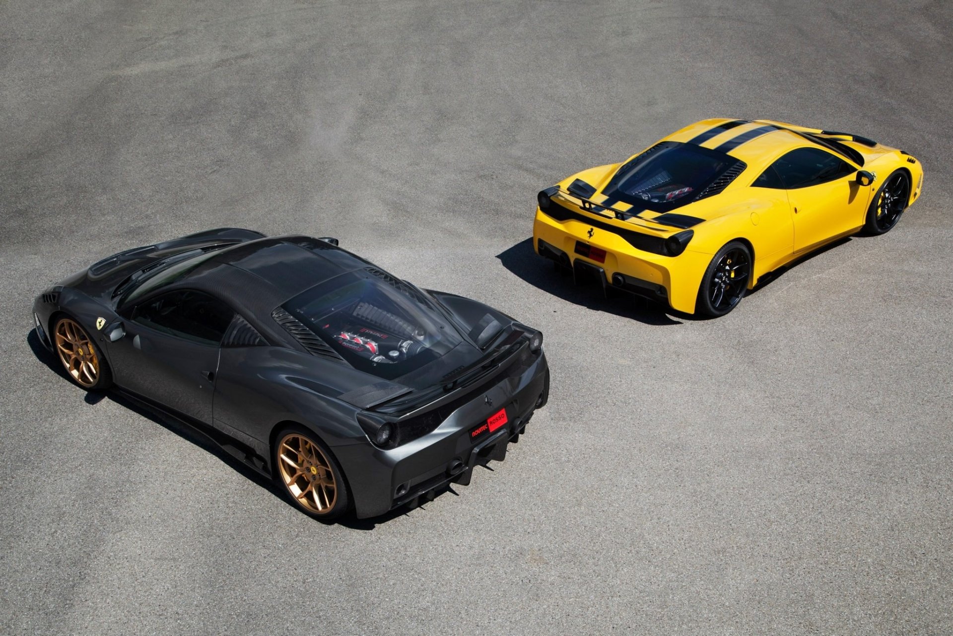HD Ferrari Supercar Duo: Sleek Black & Bold Yellow on the Road