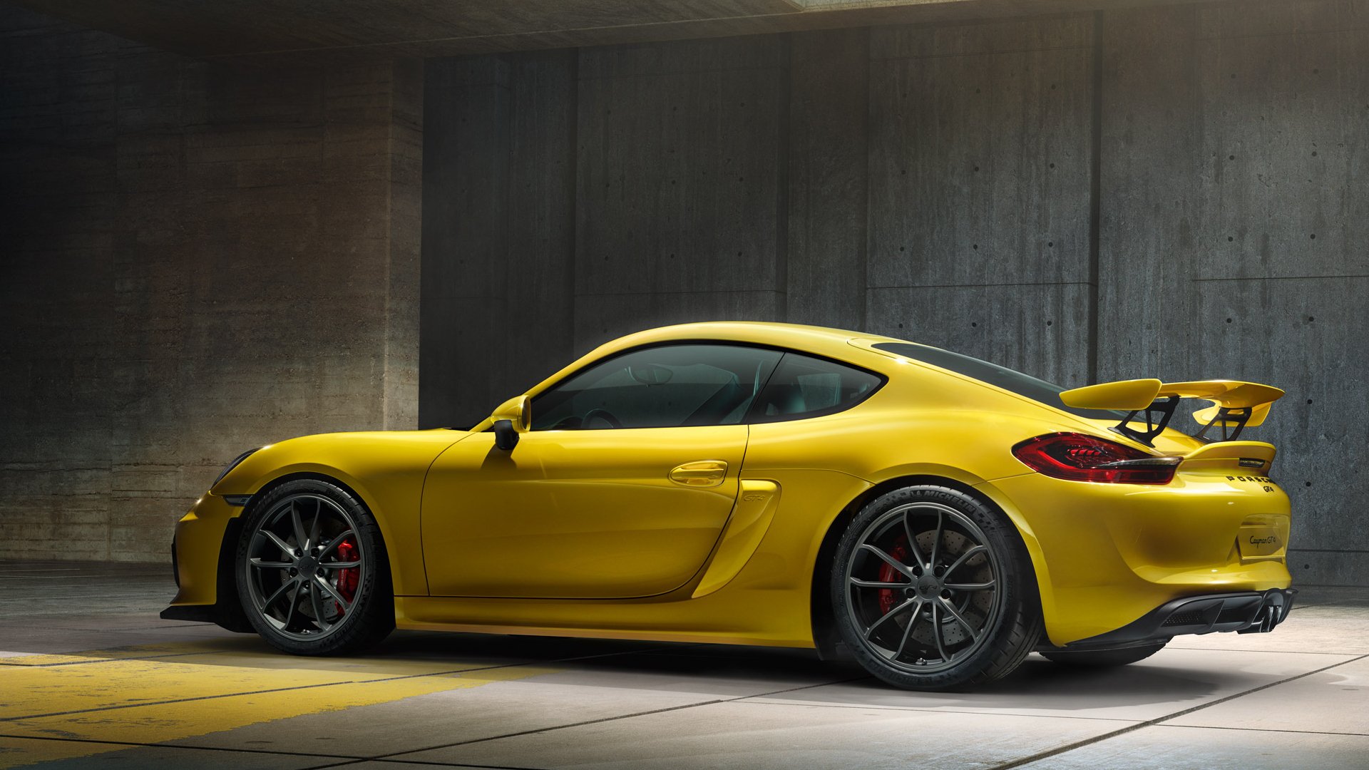 Sleek Yellow Porsche Cayman GT4 HD Wallpaper