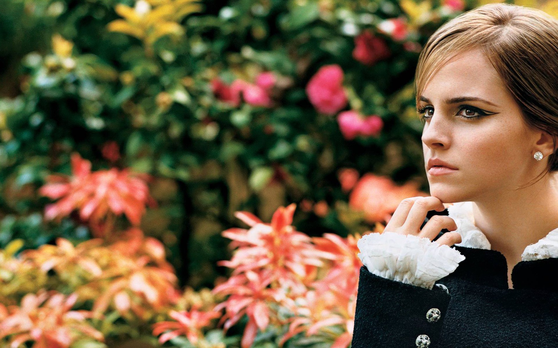 Emma Watson: Stunning HD Wallpaper in a Floral Setting