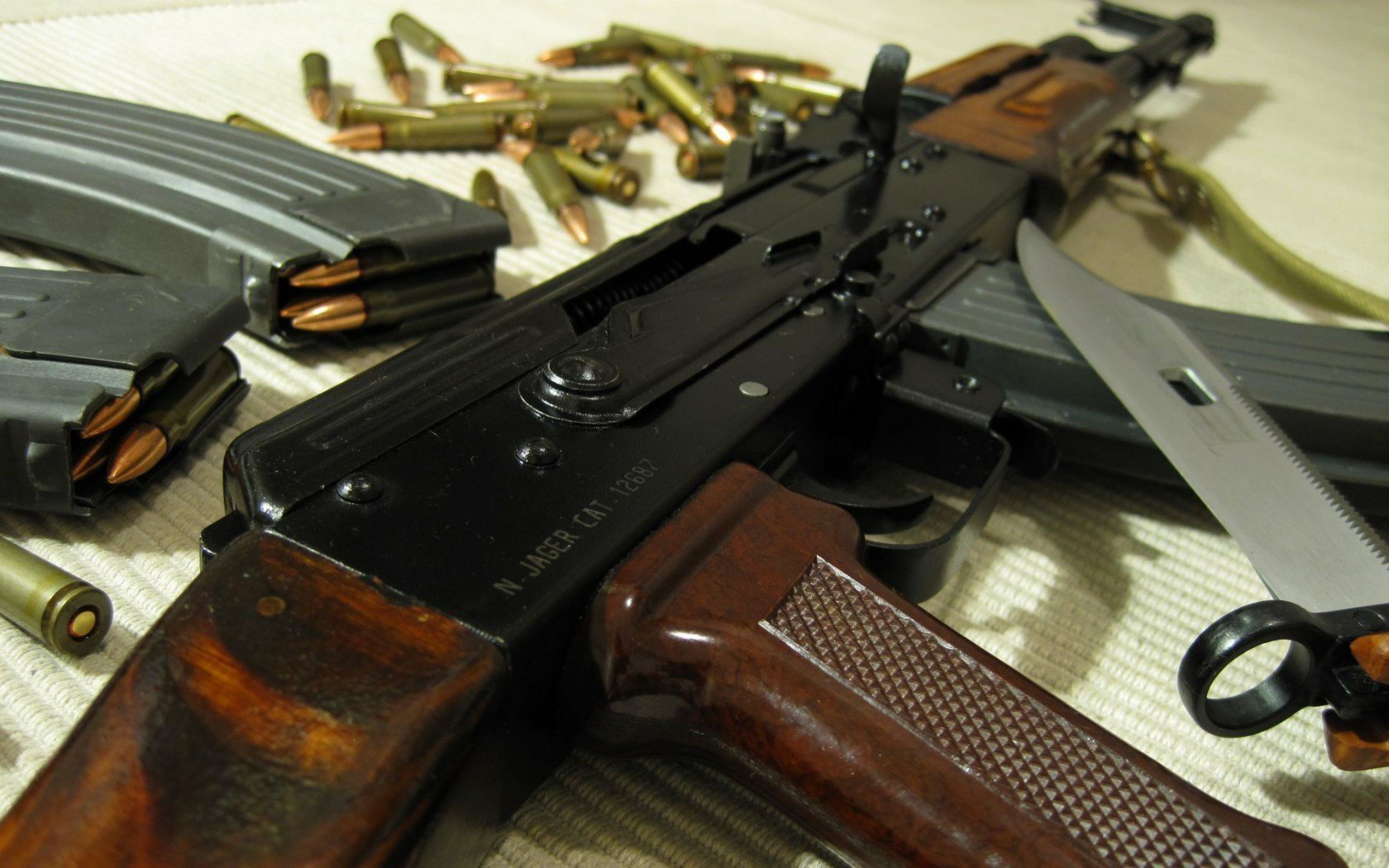 HD Wallpaper: The Power of the AK-47 and Its Ammo | 1680x1050 ...