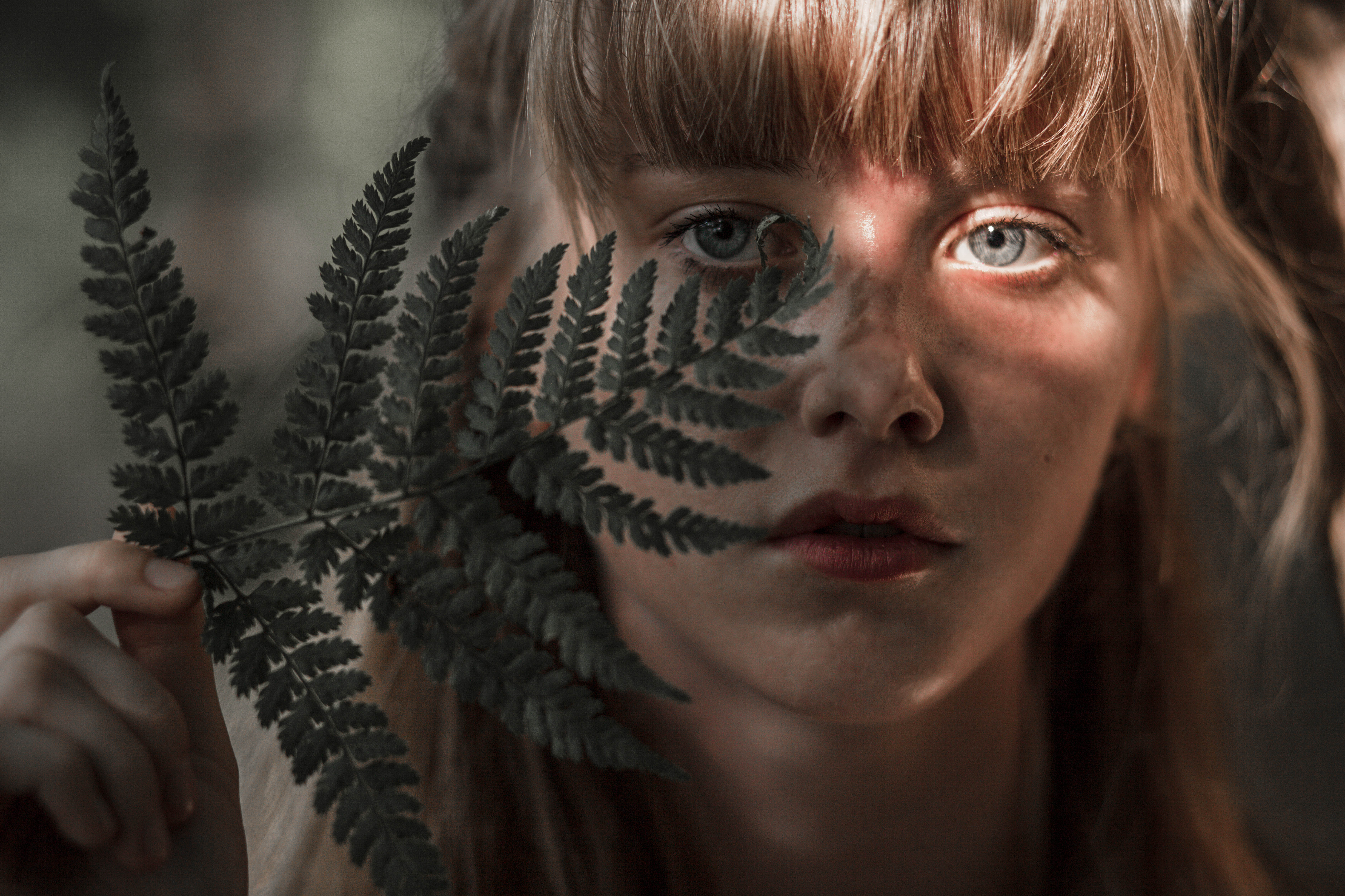 Sunlit Gaze: Blonde Beauty with Blue Eyes and Fern in 4K Ultra HD by ...