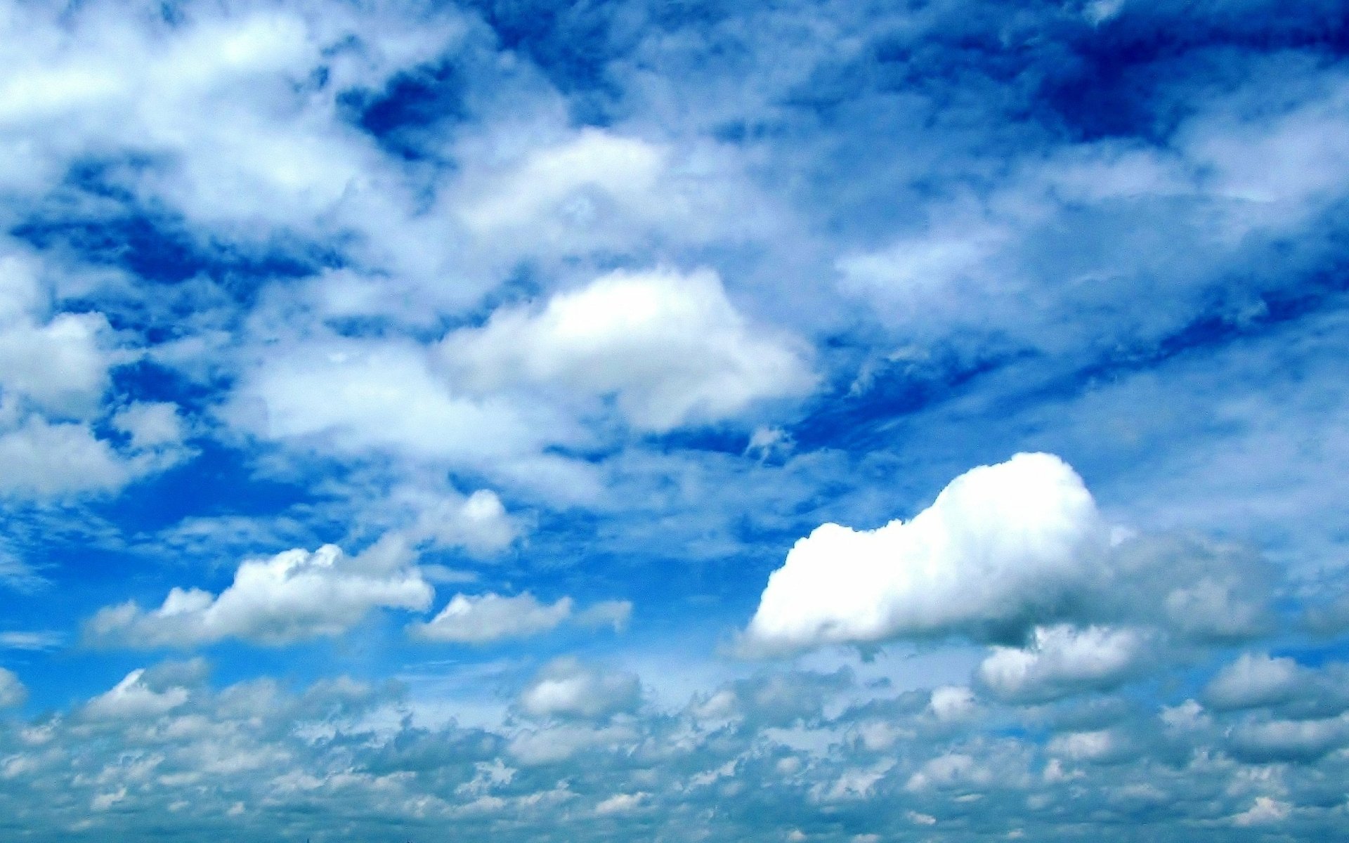 Serene Blue Sky with Fluffy White Clouds - HD Nature Wallpaper