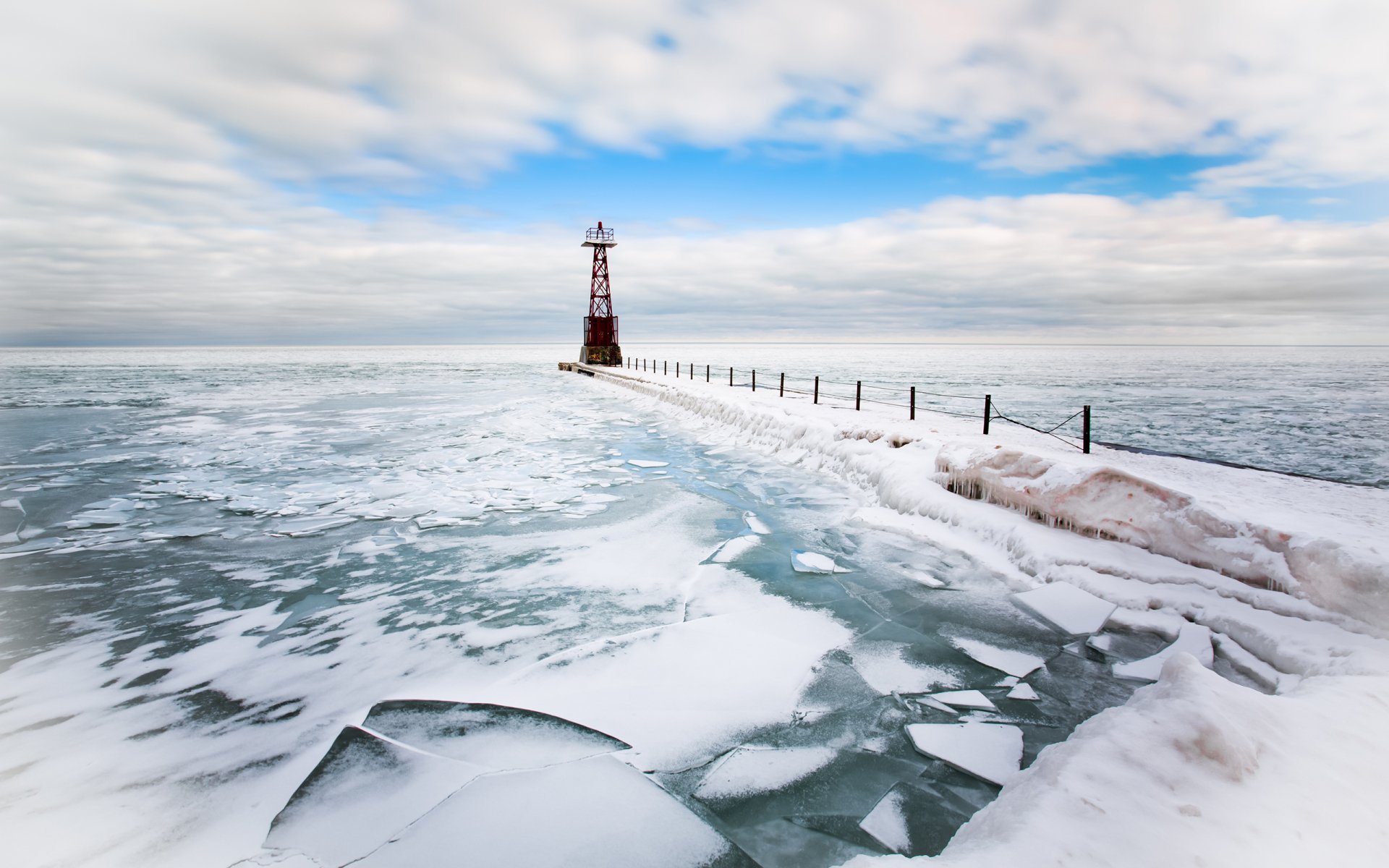 Icy Horizon: Winter Lighthouse Over a Frozen Sea (2K Wallpaper ...