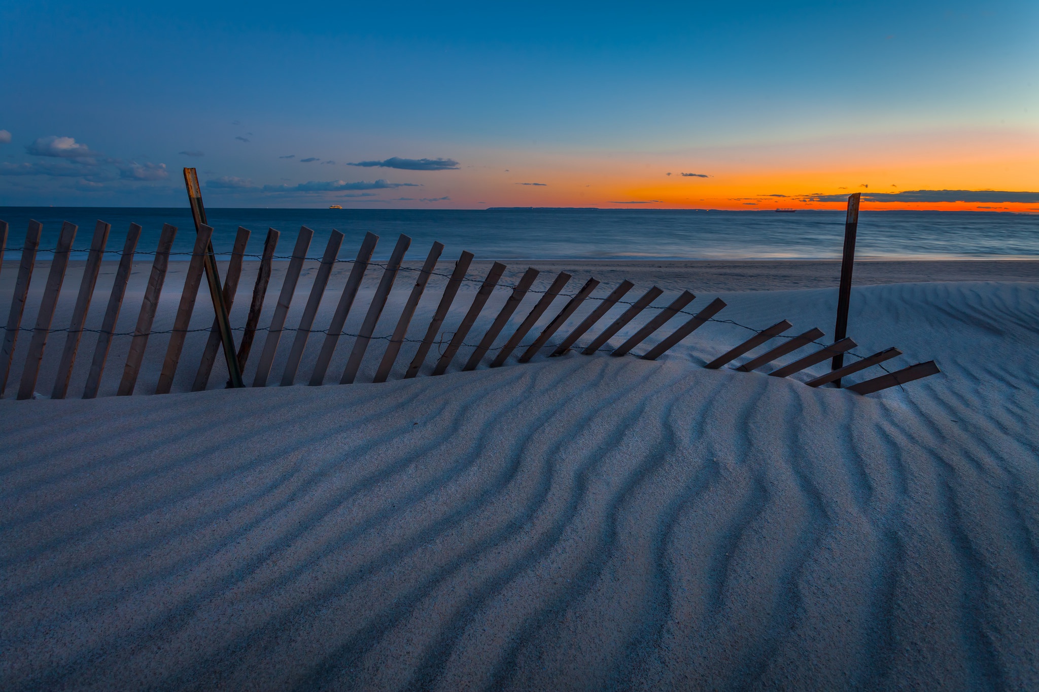 Download Fence Horizon Sunset Beach Sand Photography Ocean HD Wallpaper