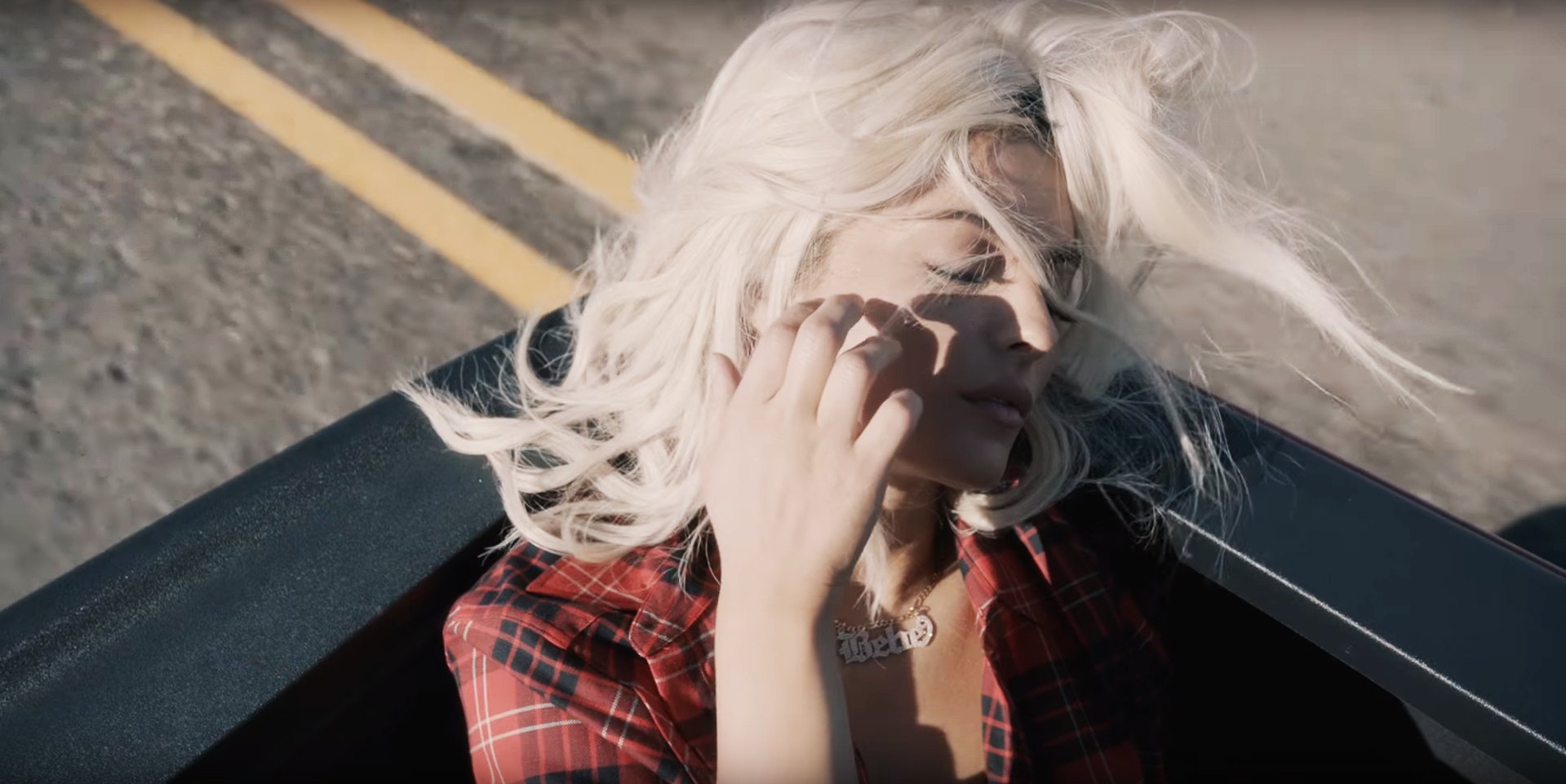 Sunlit Blonde Vibes: Bebe Rexha Music Moment HD Wallpaper