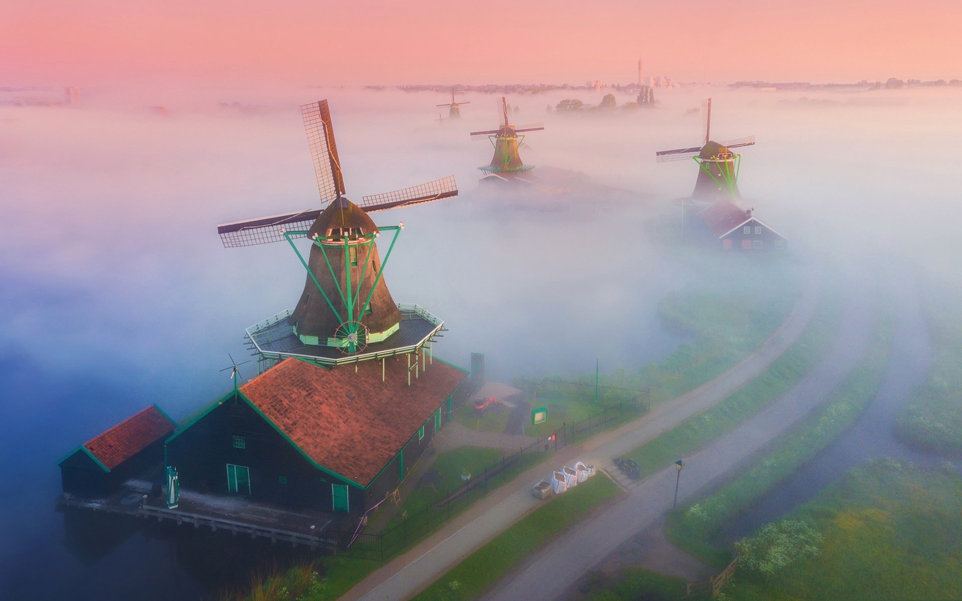 Misty Windmills: Stunning HD Foggy Landscape
